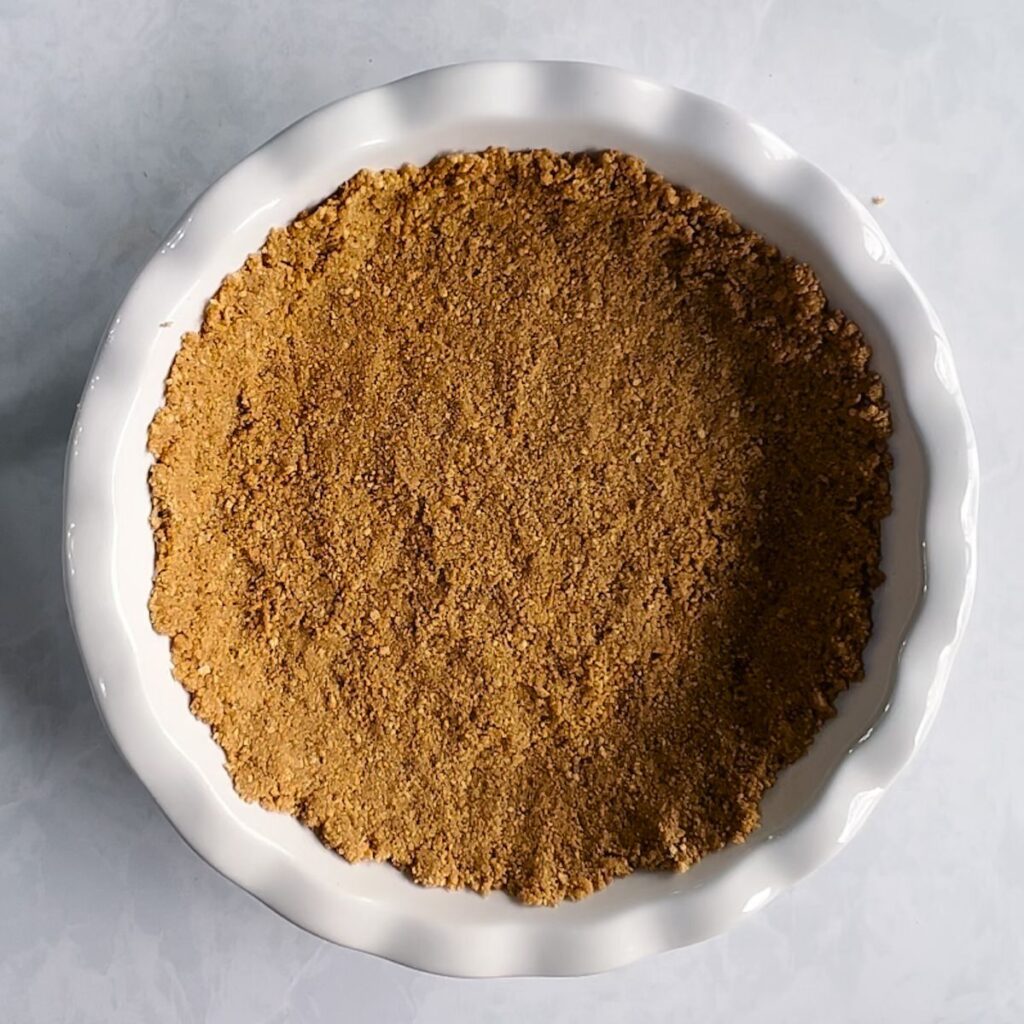 Double Layer Pumpkin Cheesecake with Graham Cracker Crust - Bake With Jamie